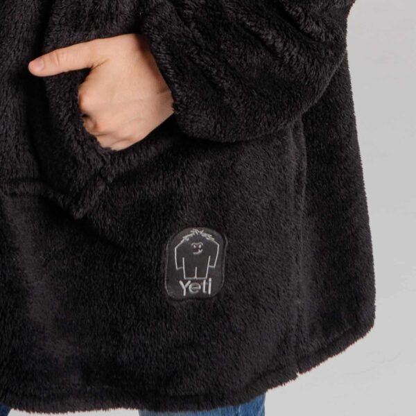 El buzo Yeti favorito de todos. Saco gigante ligero negro - Yeti Colombia